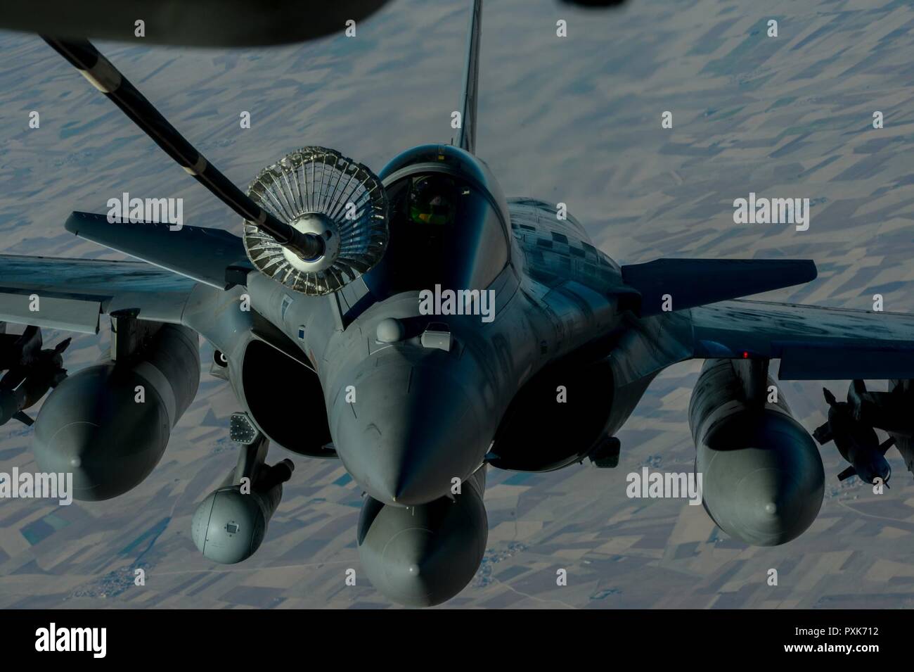 A French Naval Rafale receives fuel from a 908th Expeditionary Air ...