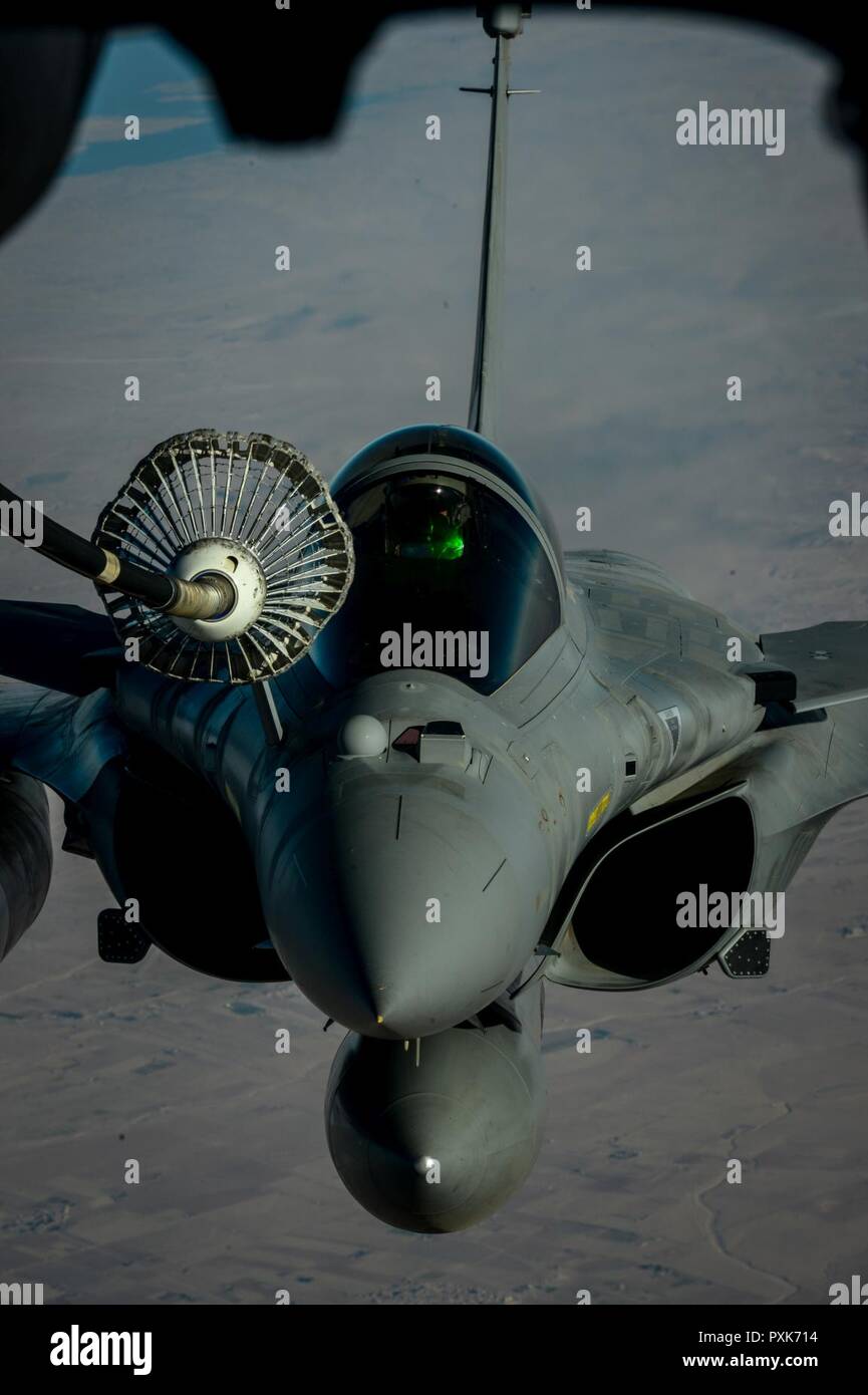 A French Naval Rafale receives fuel from a 908th Expeditionary Air ...