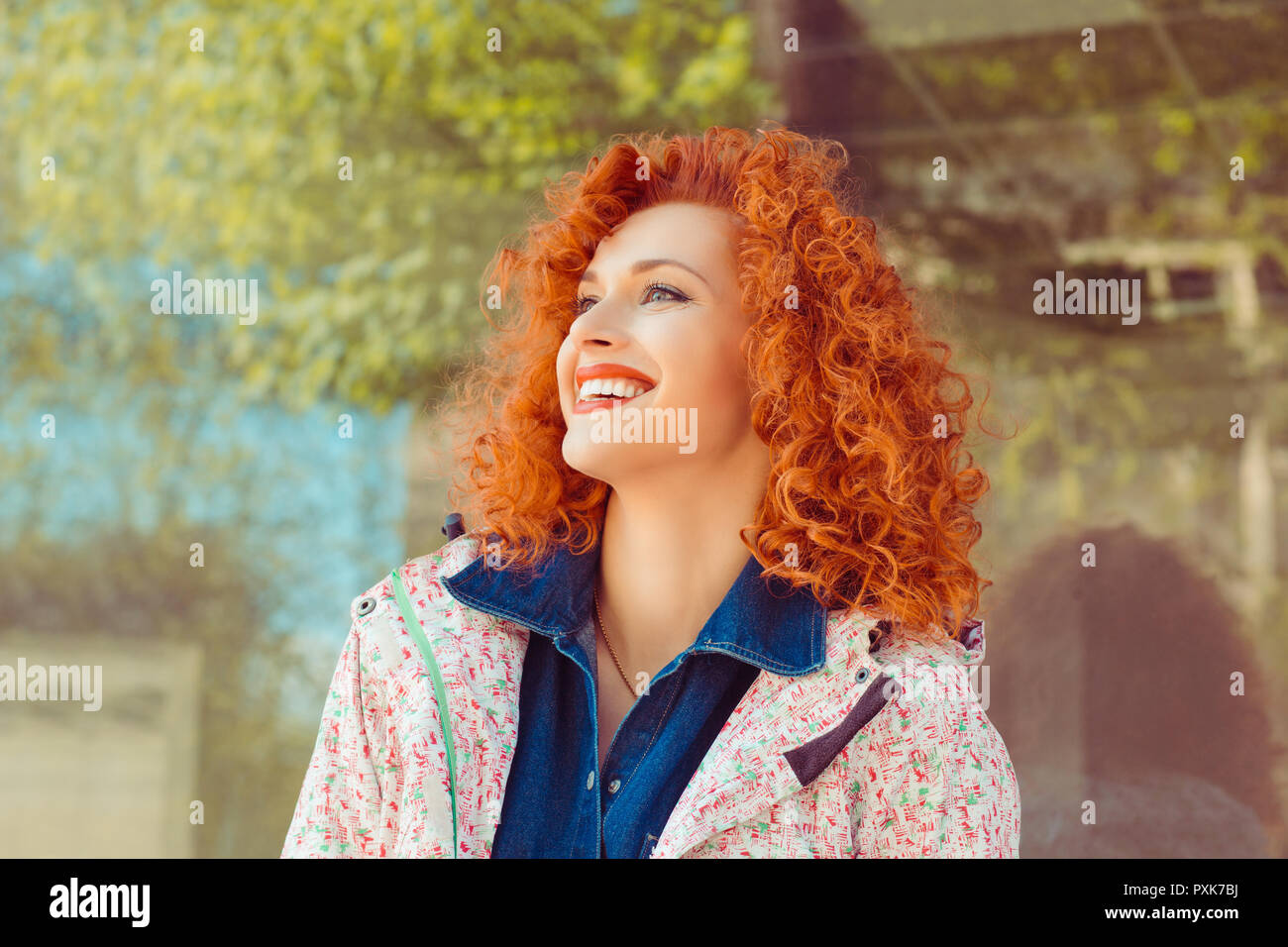 Happy girl outside Stock Photo - Alamy