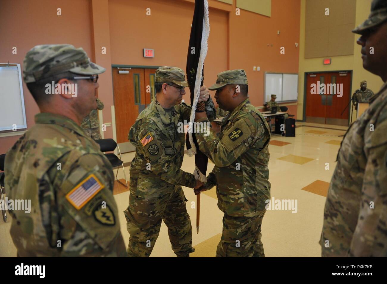 Col. Richard Toye, entrusting Lt. Col. RC Chao with the responsibility ...