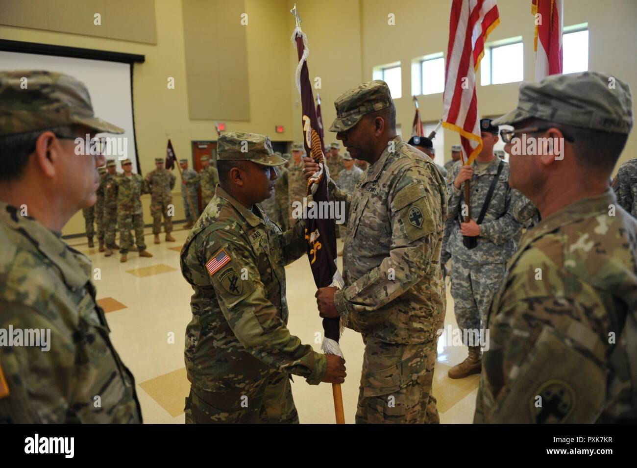 Lt. Col. RC Chao transfers the colors to Command Sgt. Maj. Carlos ...