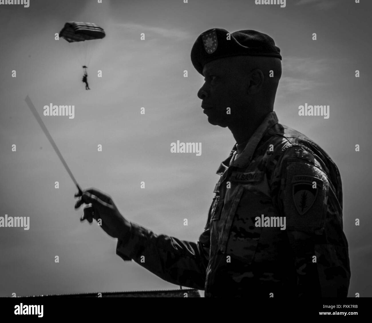 Lieutenant Colonel Dwayne Milburn conducts the USAREUR Band as soldiers ...
