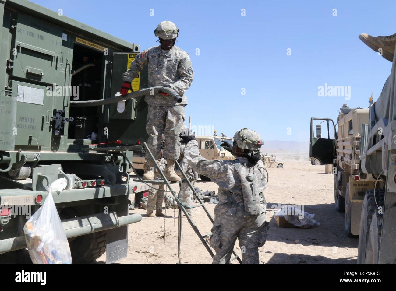 Sgt. Willie Hayes and Spc. Cynthia Thompson, water treatment ...