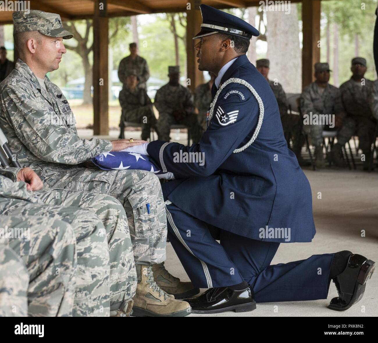 Staff Sgt. Gregory Barker, 96th Force Support Squadron, presents the ...