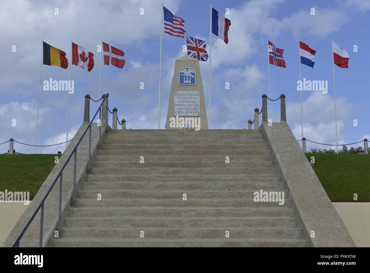 Flags from nine different countries are raised during the Main Ceremony ...