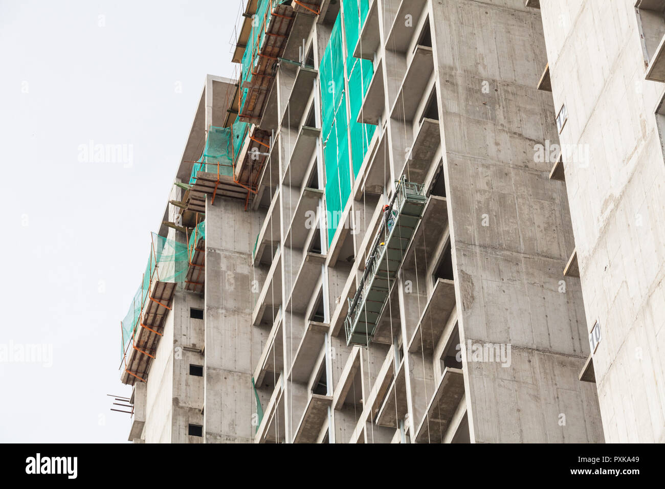 The technology or art of high rise apartment construction using crane ...