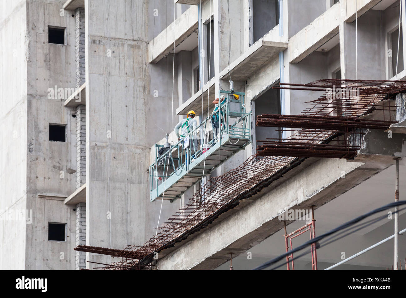 The technology or art of high rise apartment construction using crane ...