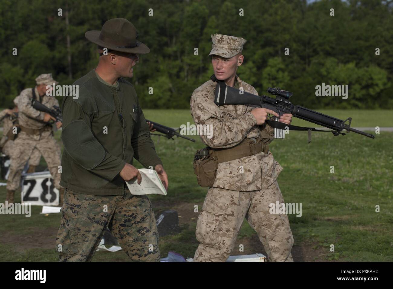 U.S. Marine Corps Sgt. Max Tackett, primary marksmanship instructor ...