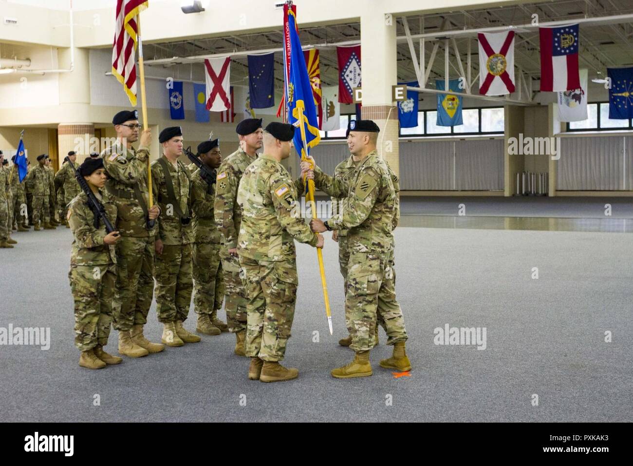 Col. Jeffrey A. Becker, commander, 3rd Combat Aviation Brigade hands ...