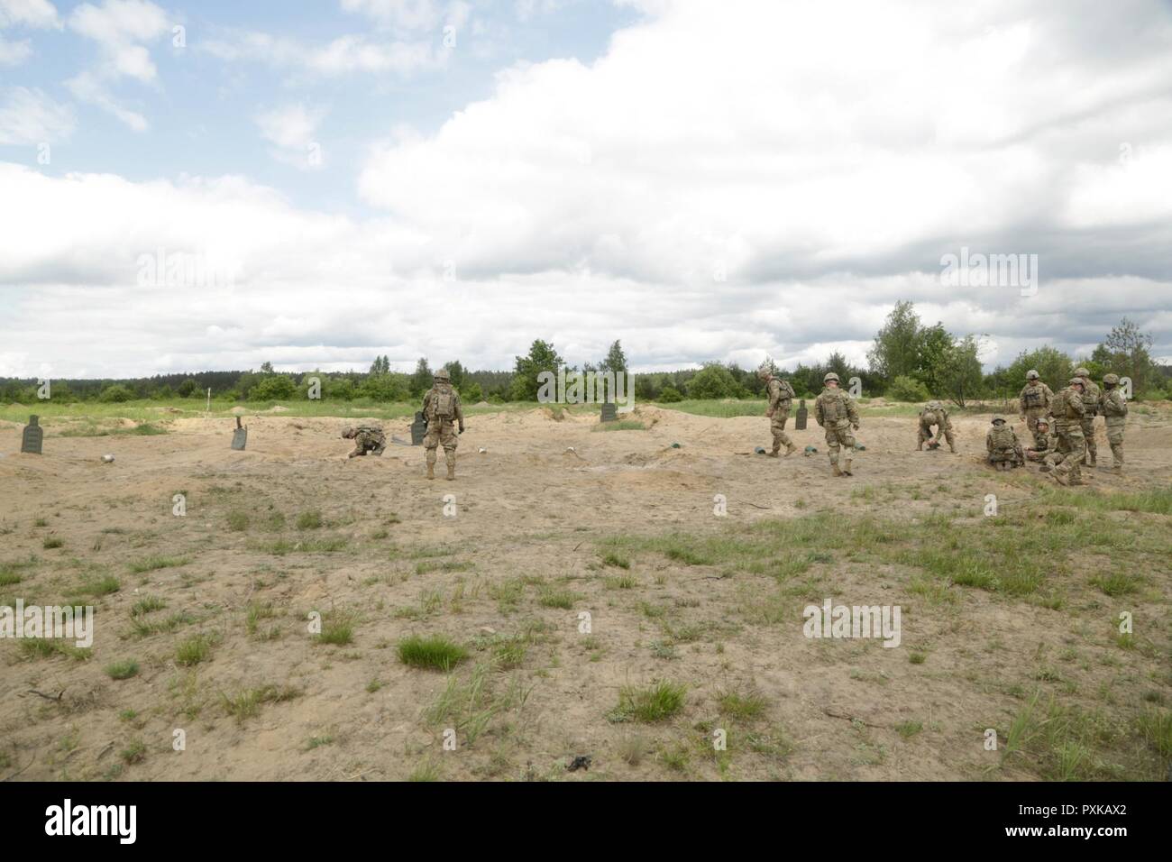 U.S. soldiers prepare grapeshot charges at a demolition site at the ...