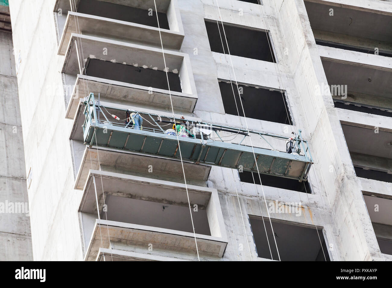 The technology or art of high rise apartment construction using crane ...