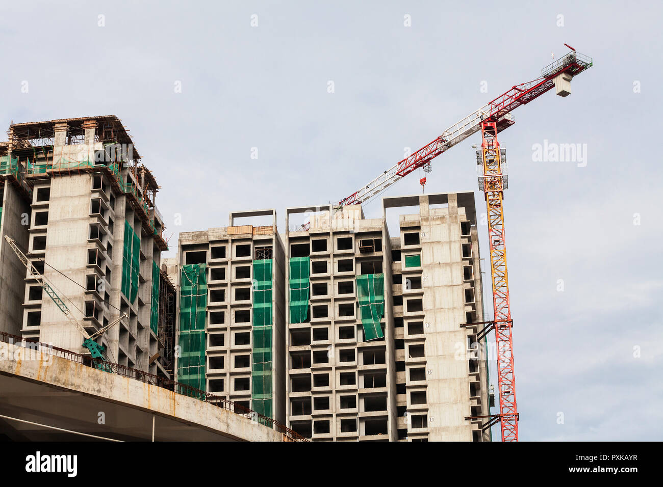 The technology or art of high rise apartment construction using crane ...