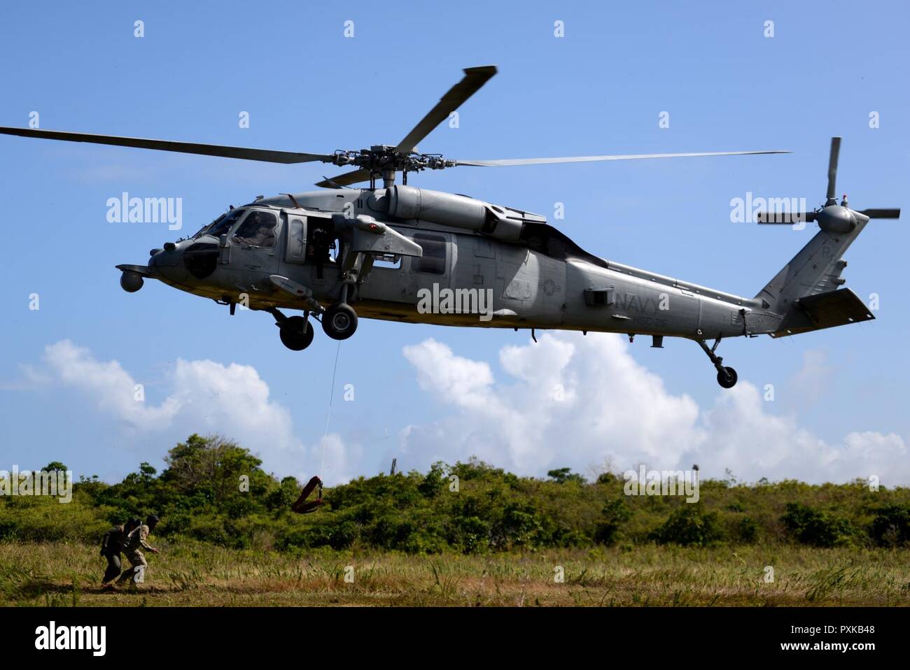 A U.S. Navy MH-60 Seahawk, assigned to Helicopter Sea Combat Squadron ...