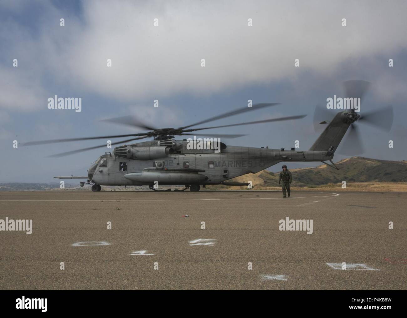 U.S. Marine Corps Staff Sgt. Brandon N. Mote, a CH-53E Super Stallion ...