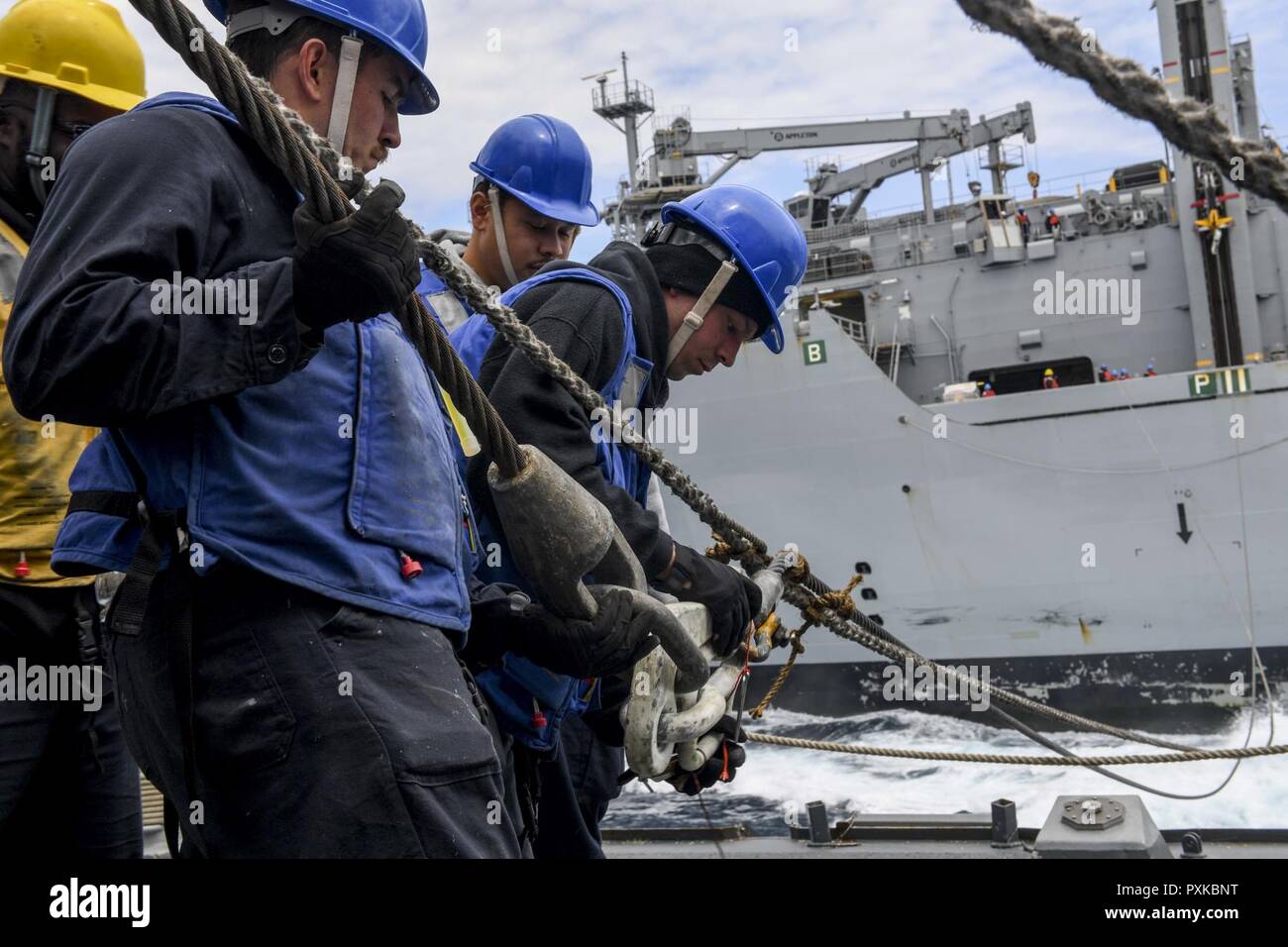 WESTERN PACIFIC (June 3, 2017) Sailors connect a span wire from Lewis ...