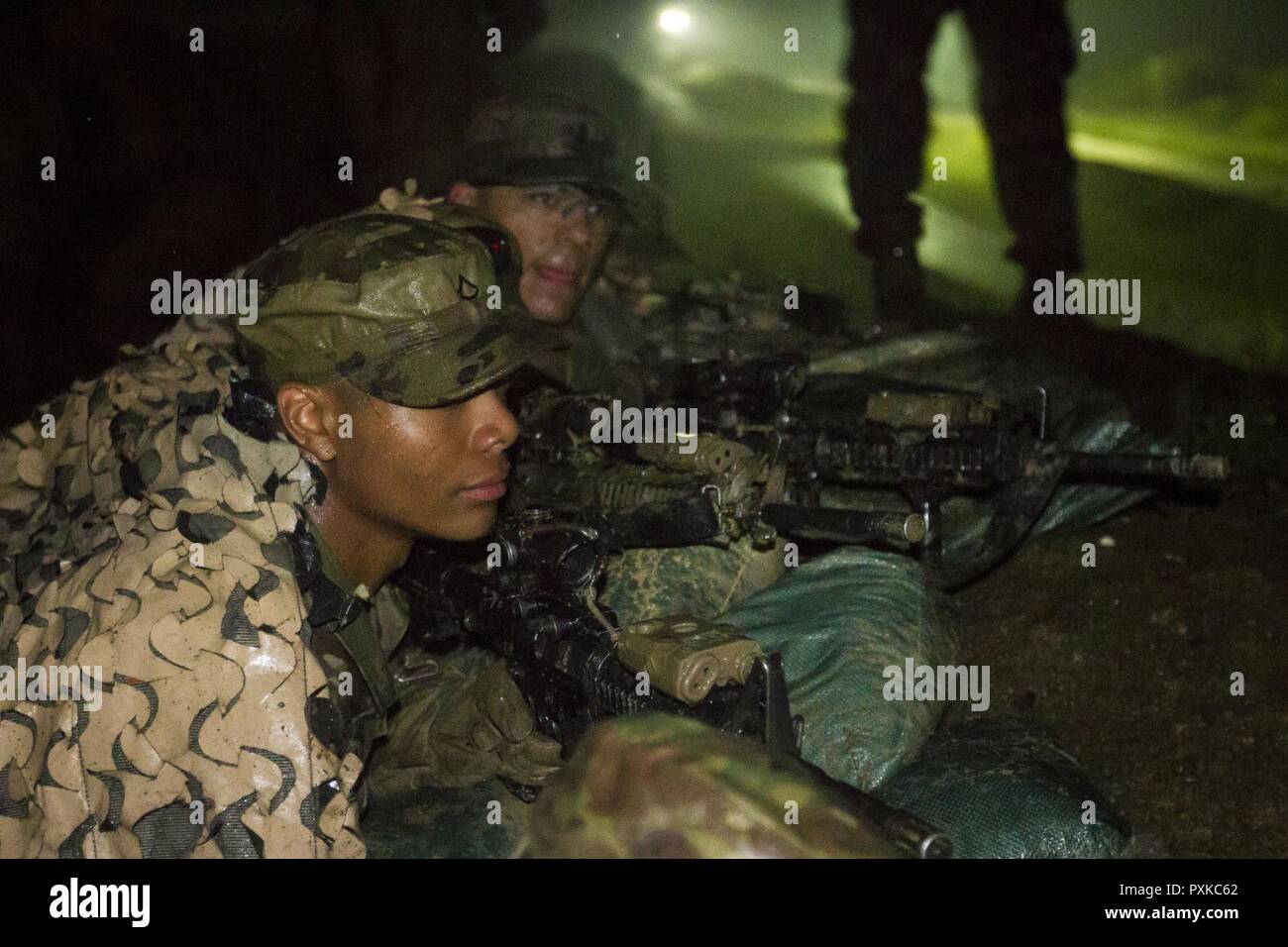 U.S. Army Soldiers, assigned to Multinational Battle Group-East’s ...