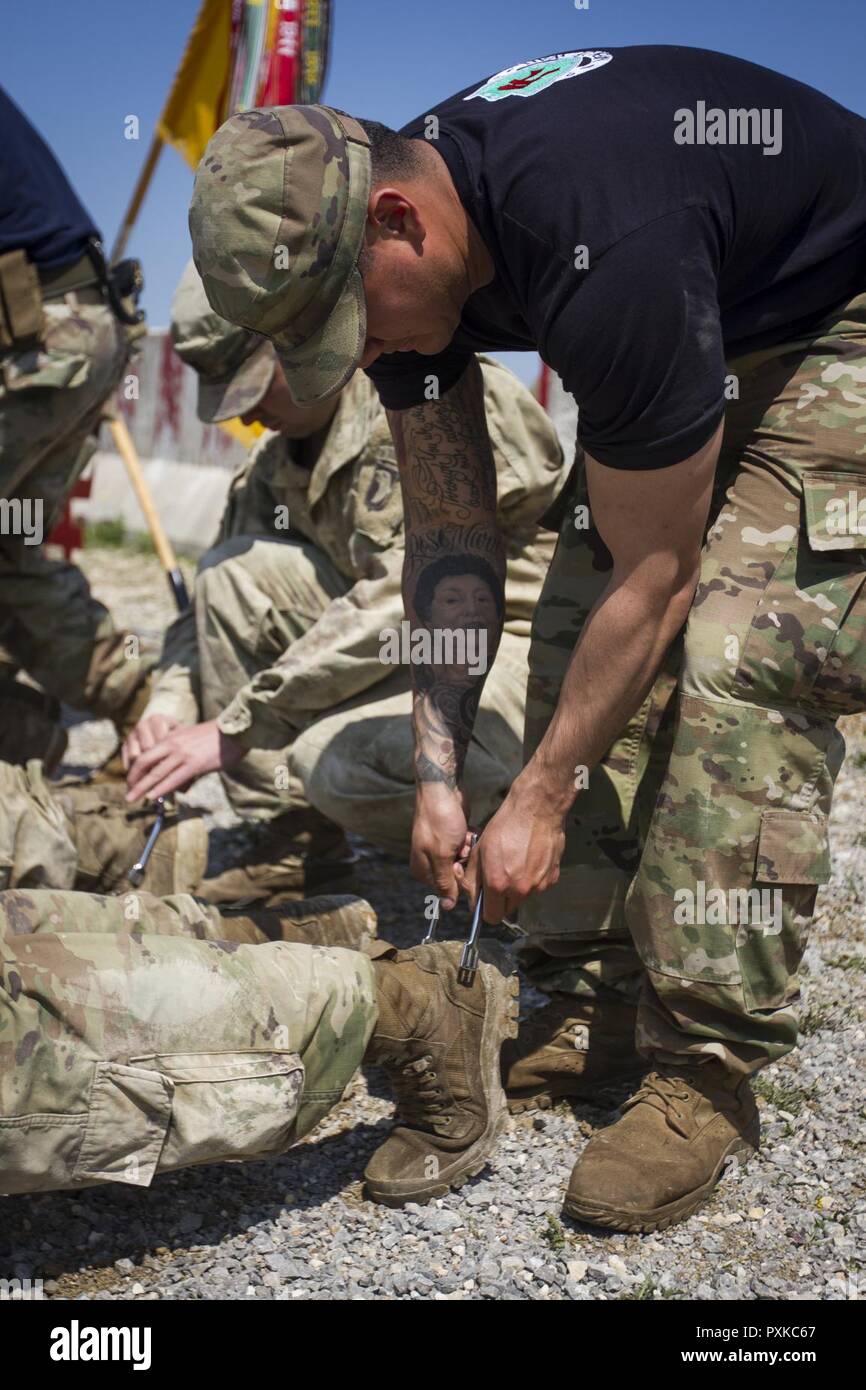 U.S. Army Soldiers, assigned to Multinational Battle Group-East’s ...