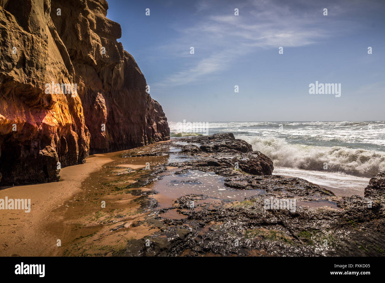 Ocean Cliff with waves Stock Photo - Alamy