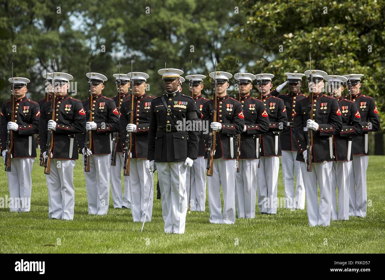Marines with First Platoon, Bravo Company, render honors during a full ...