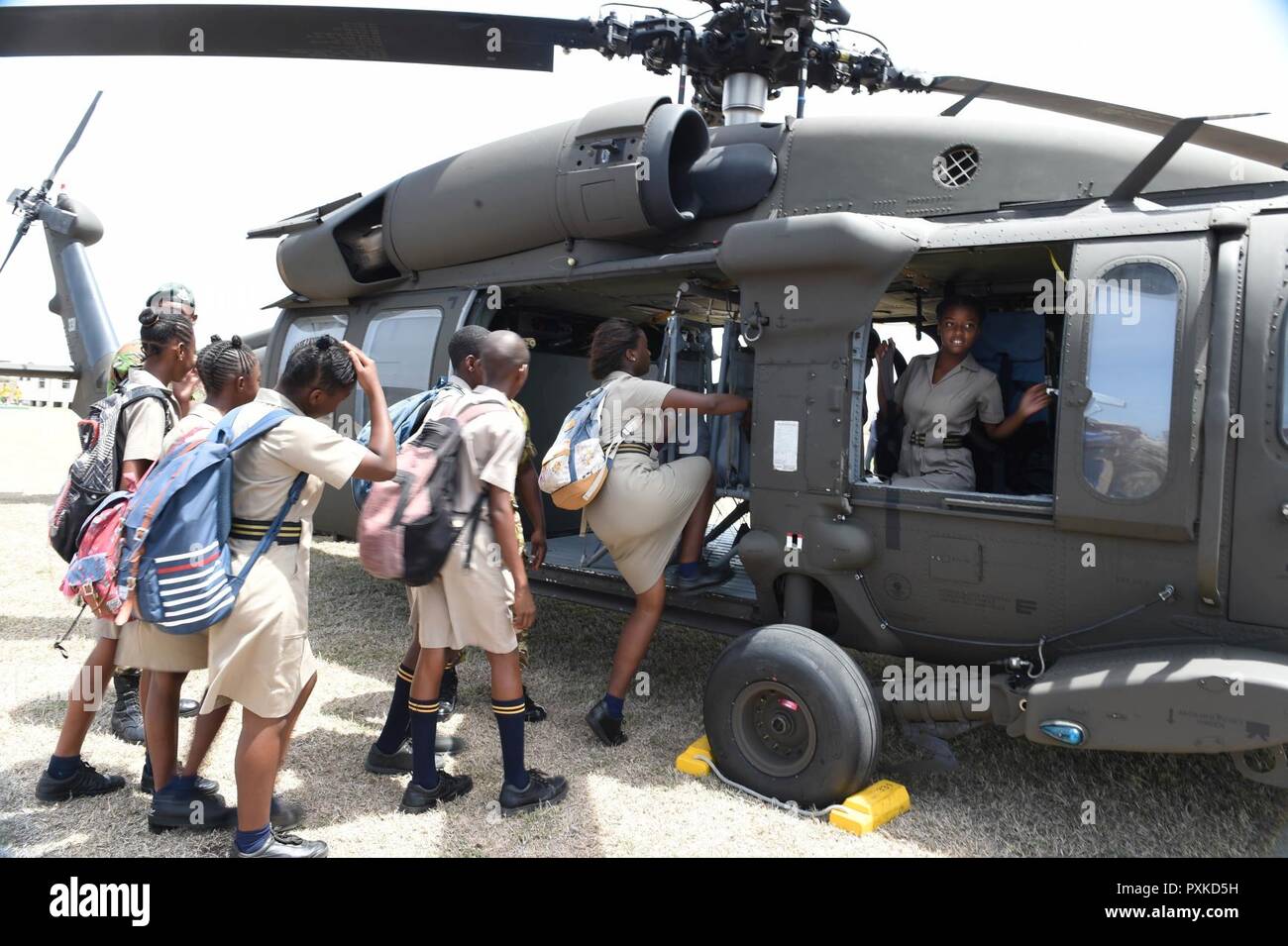 3 Students from Combermere School climb into a UH-60L Black Hawk ...