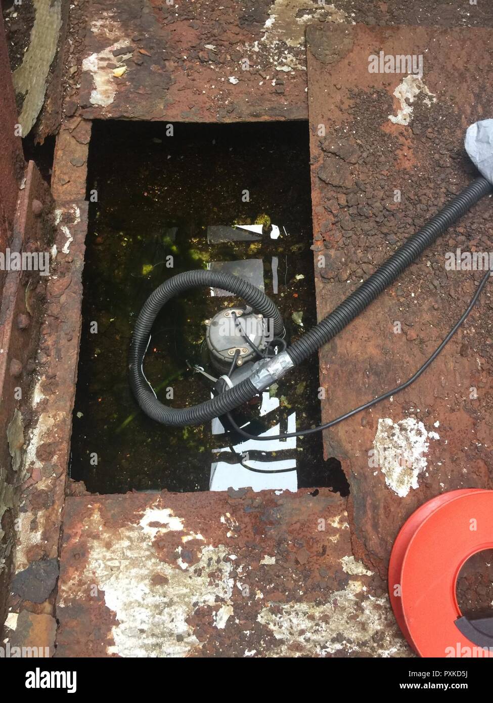 A contractor from the National Response Corporation Environmental ...