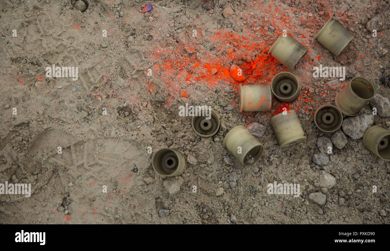 M-203 shell casings lay on the range during a live fire training ...