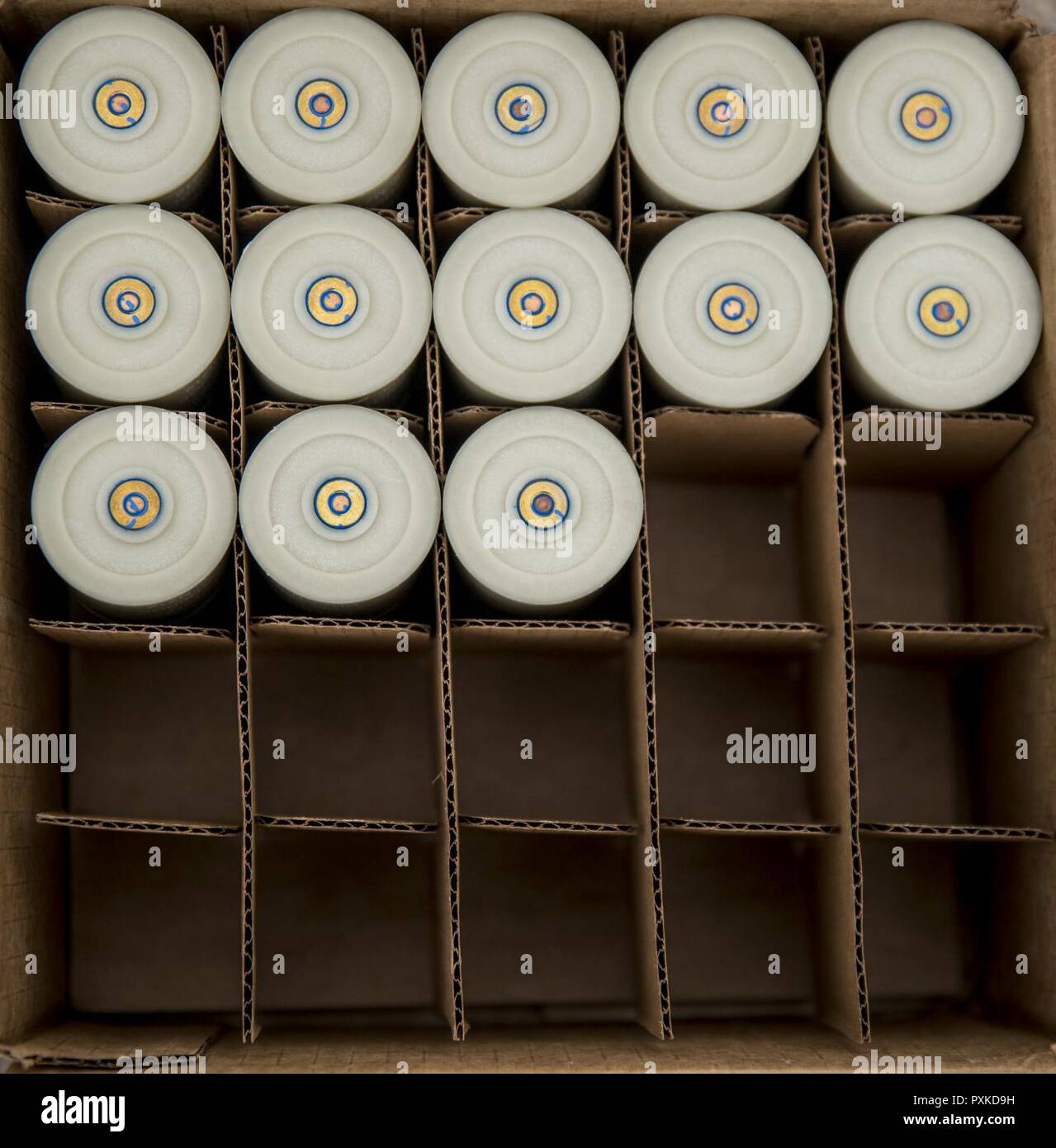 A box of 40mm practice rounds are staged for firing during a live fire ...