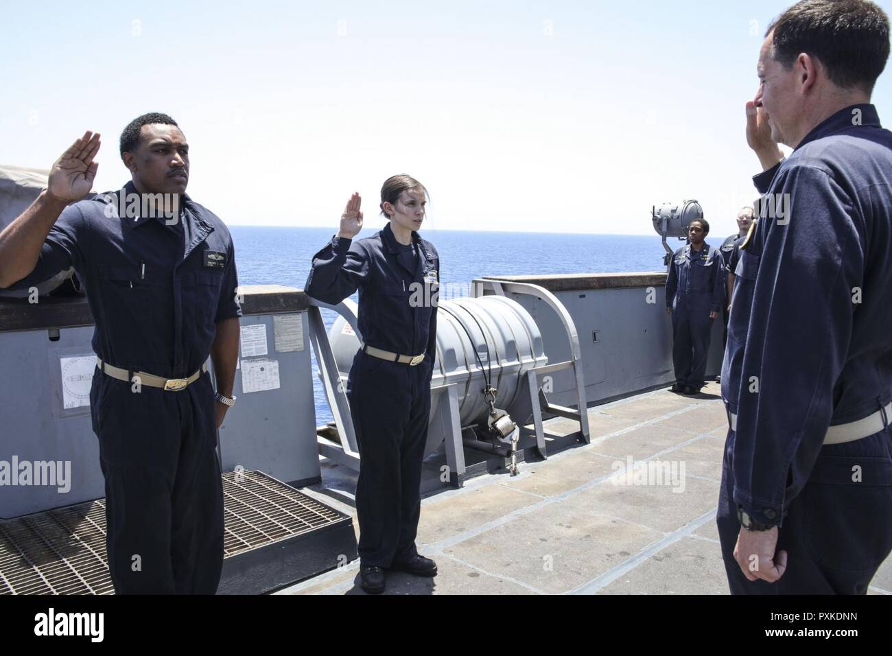 MEDITERRANEAN SEA (June 1, 2017) Newly promoted officers Lt. Travis ...