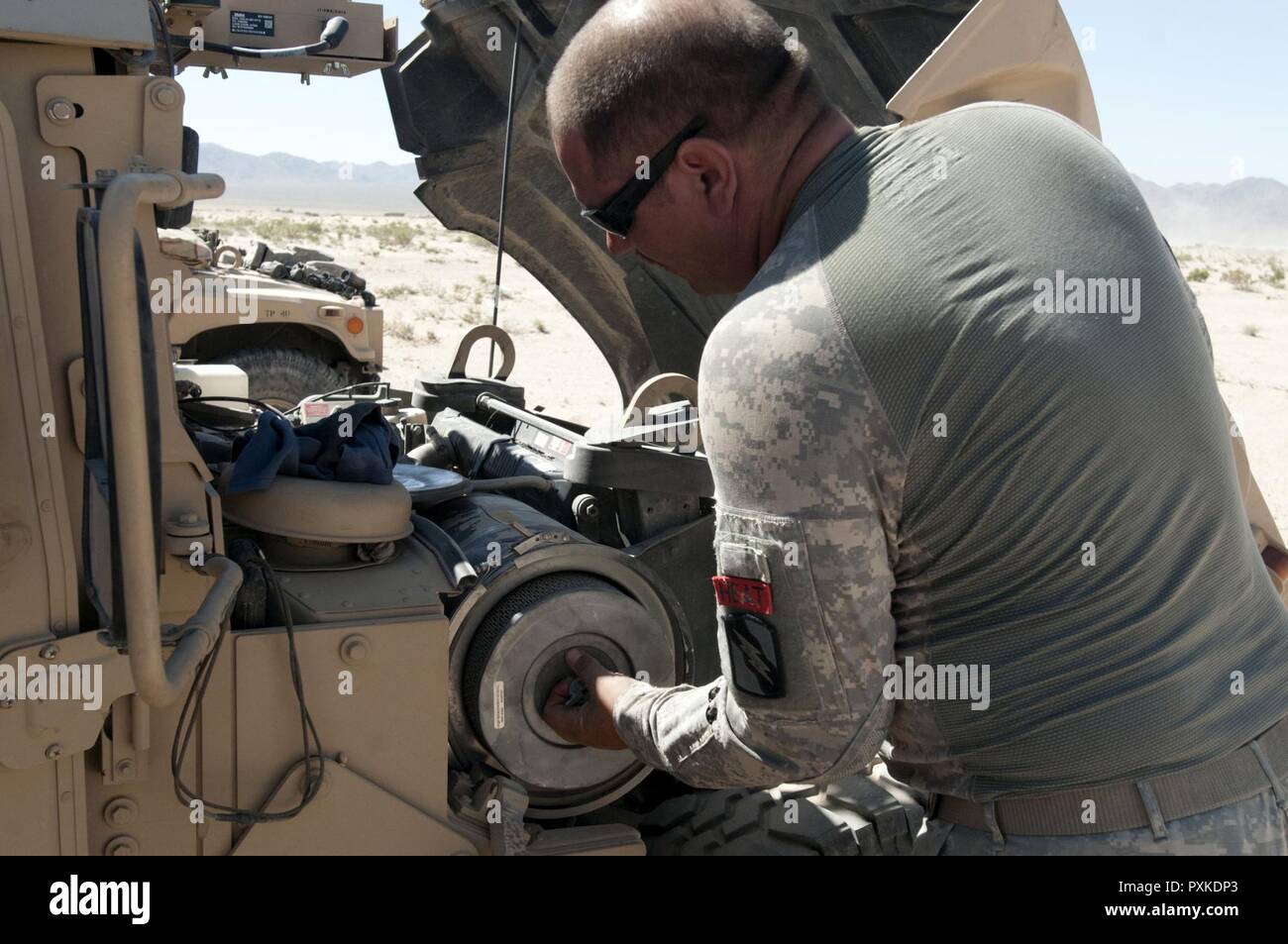 Spc. Robert Wegner with 2d Battalion, 137th Infantry Regiment, replaces ...