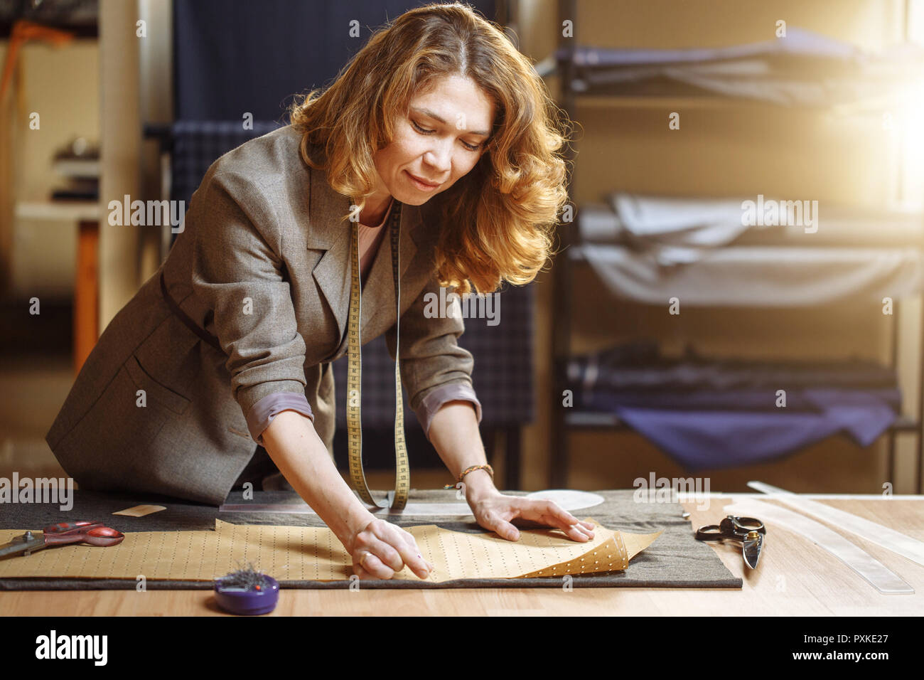 Tailor marking cloth hi-res stock photography and images - Alamy