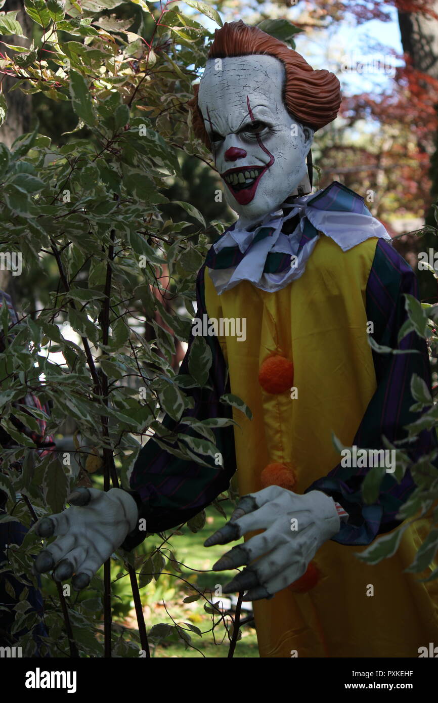 Gruesome smiling clown character displayed as eerie Halloween ...