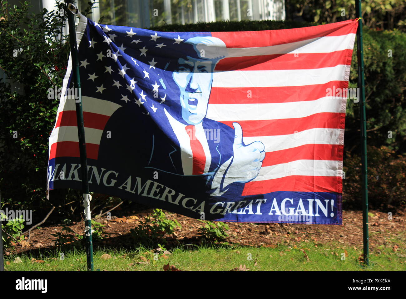 Making America Great Again flag hung on the front lawn of a residential ...