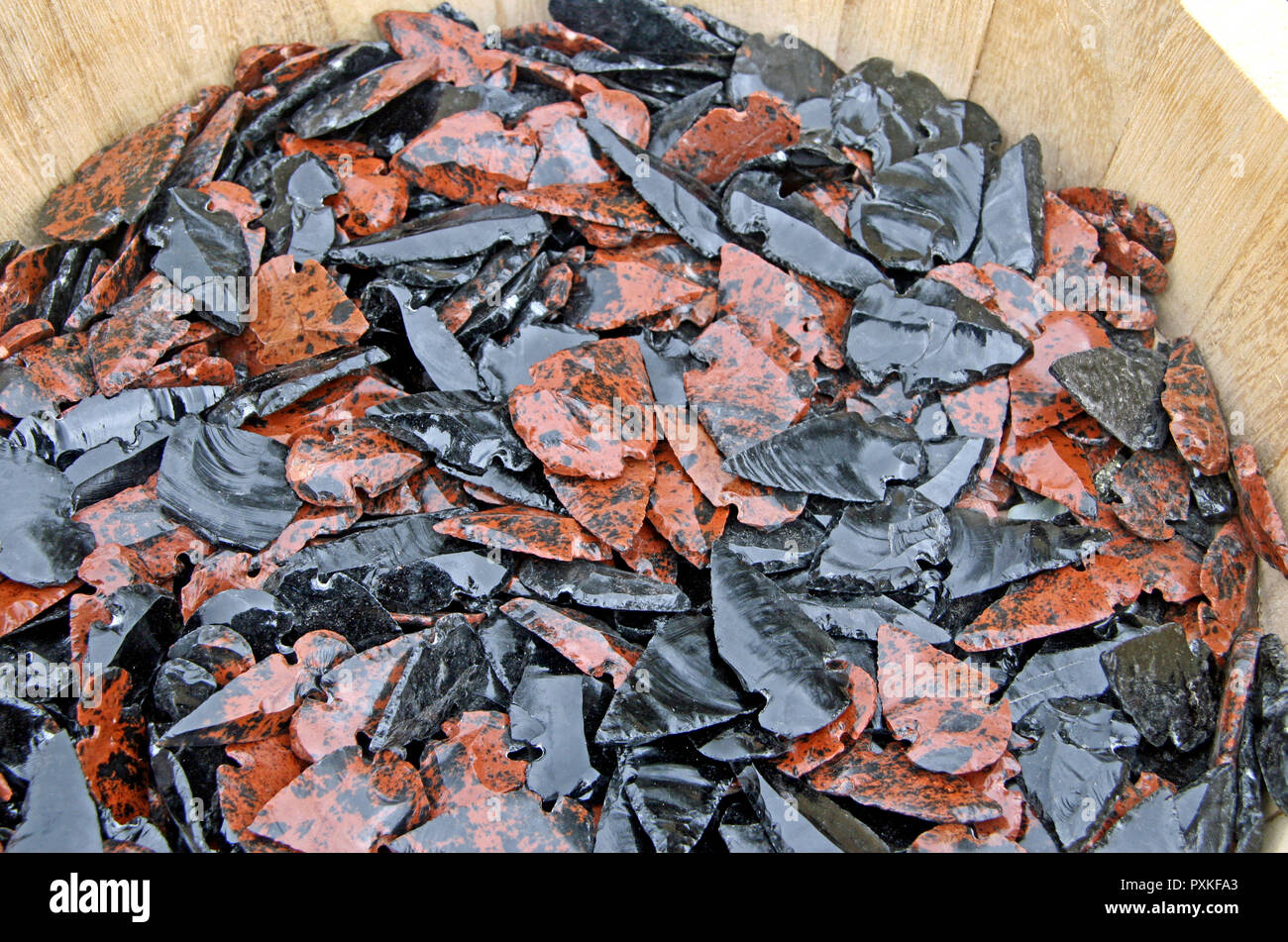 Group of hand made rock arrow heads Stock Photo - Alamy