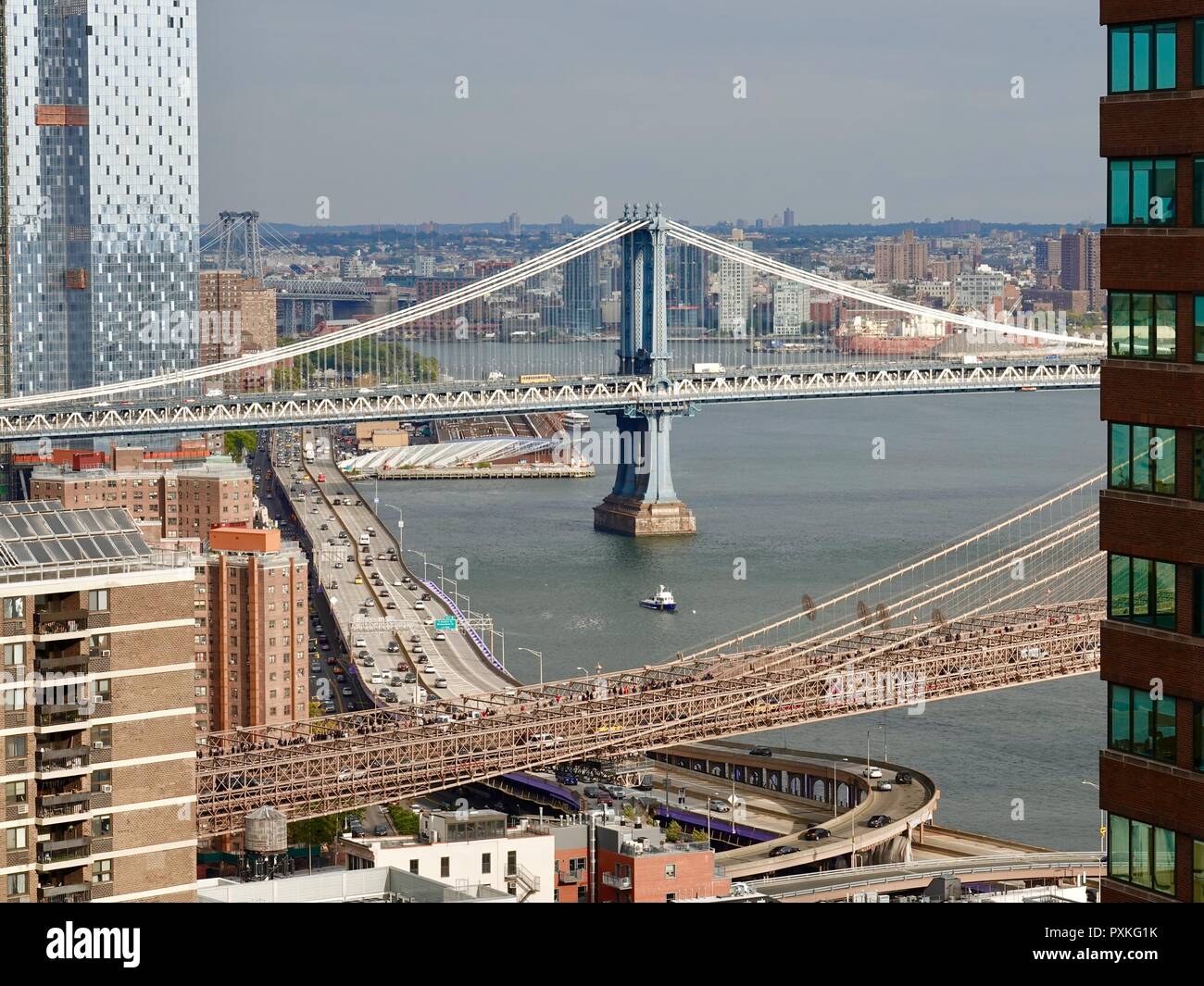 Rooftop view of the Brooklyn and Manhattan bridges, the FDR Parkway ...