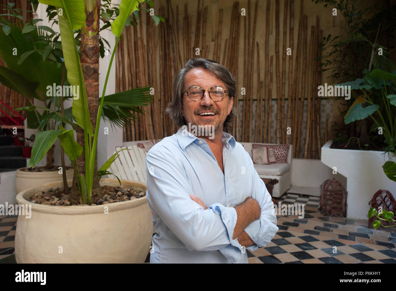 Owner of La Passion Hotel Stock Photo - Alamy