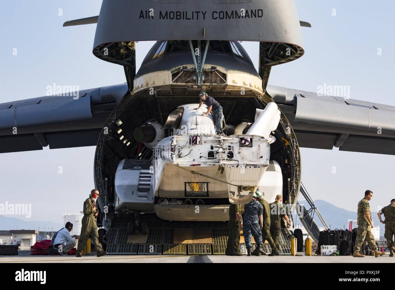 U.S. Navy Sailors with Helicopter Mine Countermeasures Squadron (HM) 12 ...
