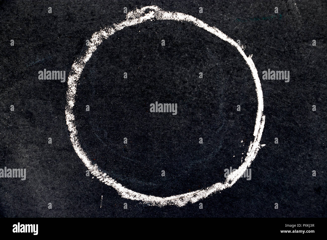 White chalk drawing as circle shape on black board background Stock ...