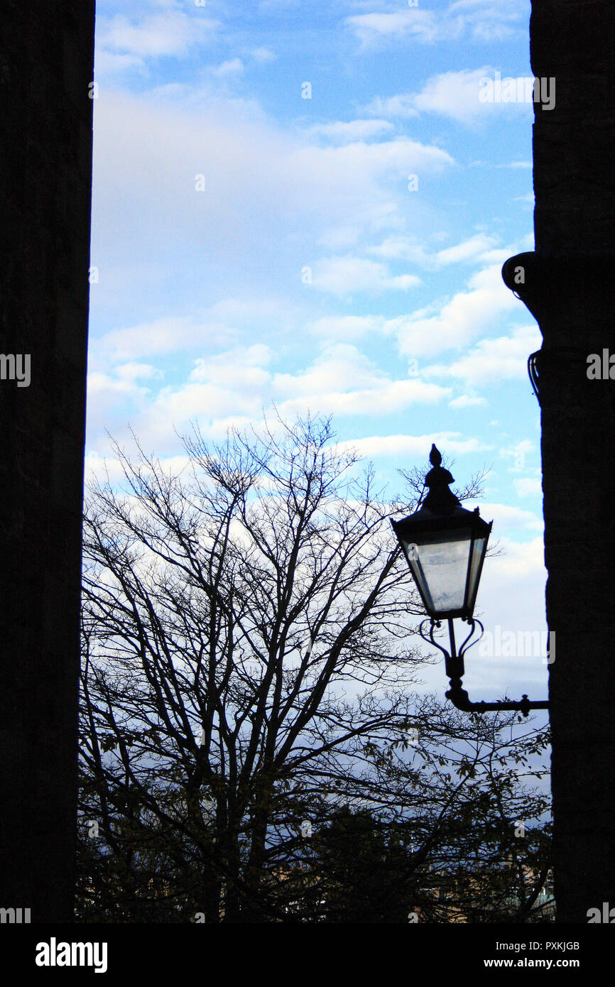 Wall-mounted lamp between two walls, Edinburgh, Scotland Stock Photo ...