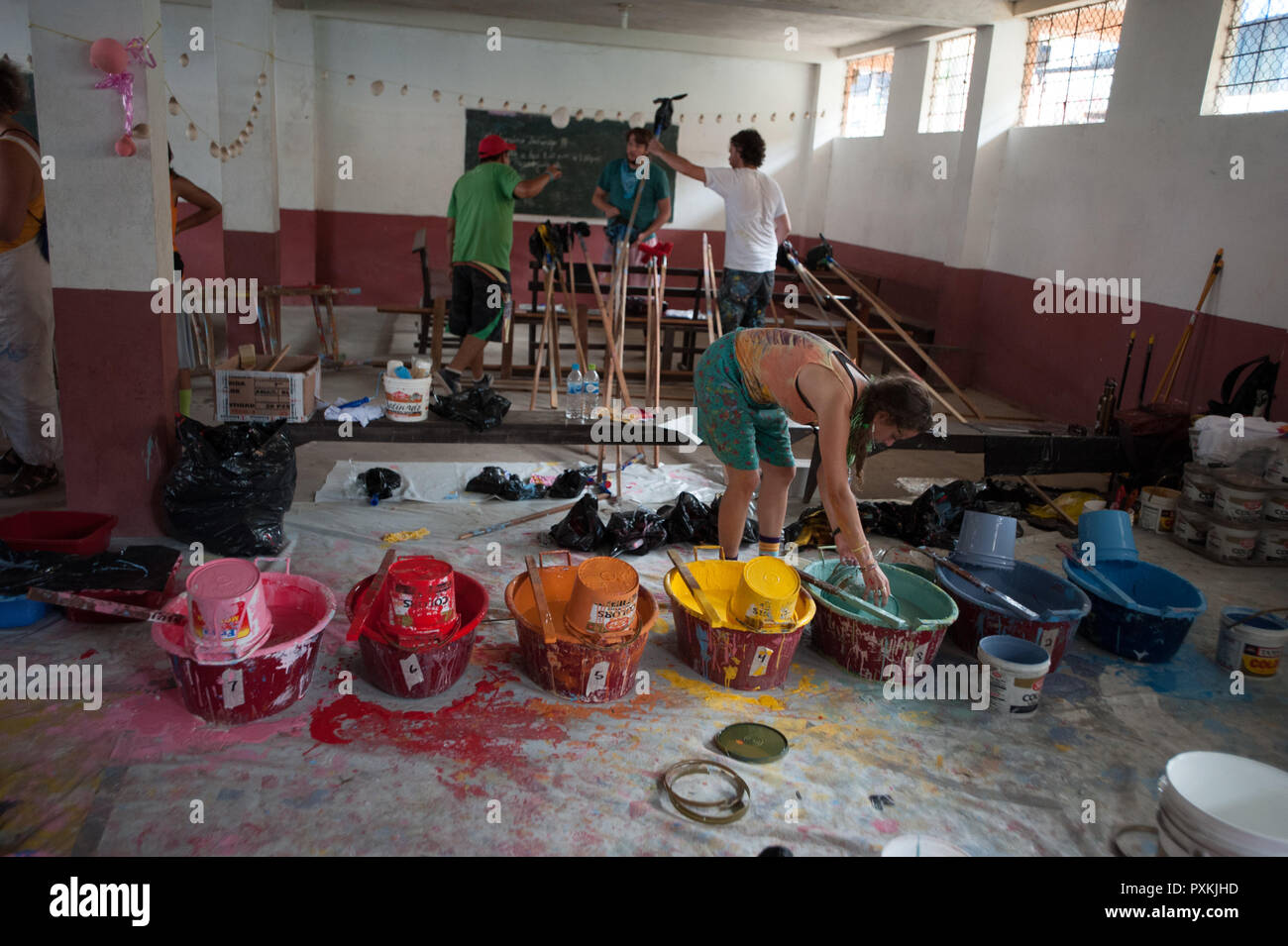 Painting the houses in Belen during the festival Stock Photo - Alamy