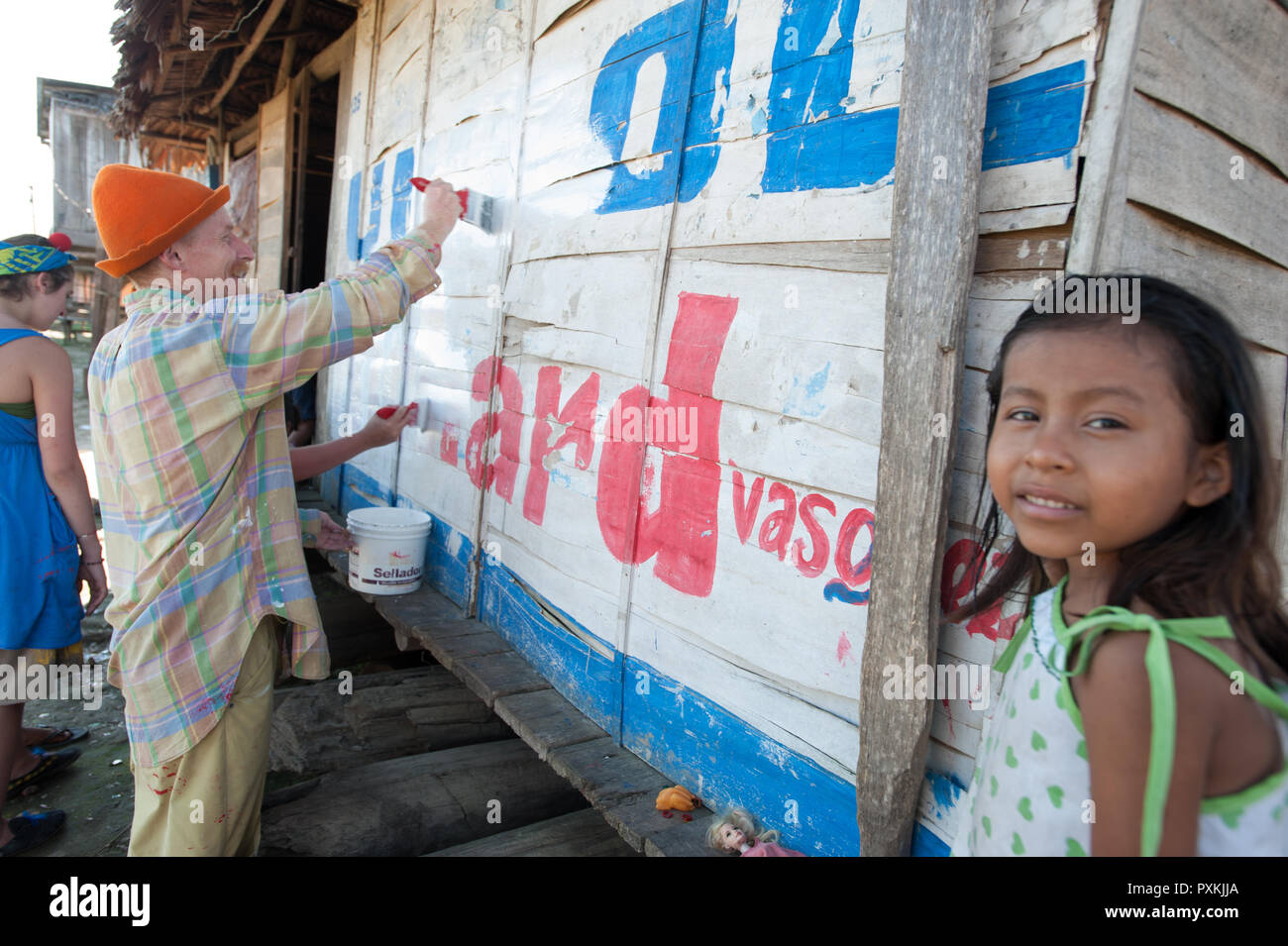 Painting the houses in Belen during the festival Stock Photo - Alamy