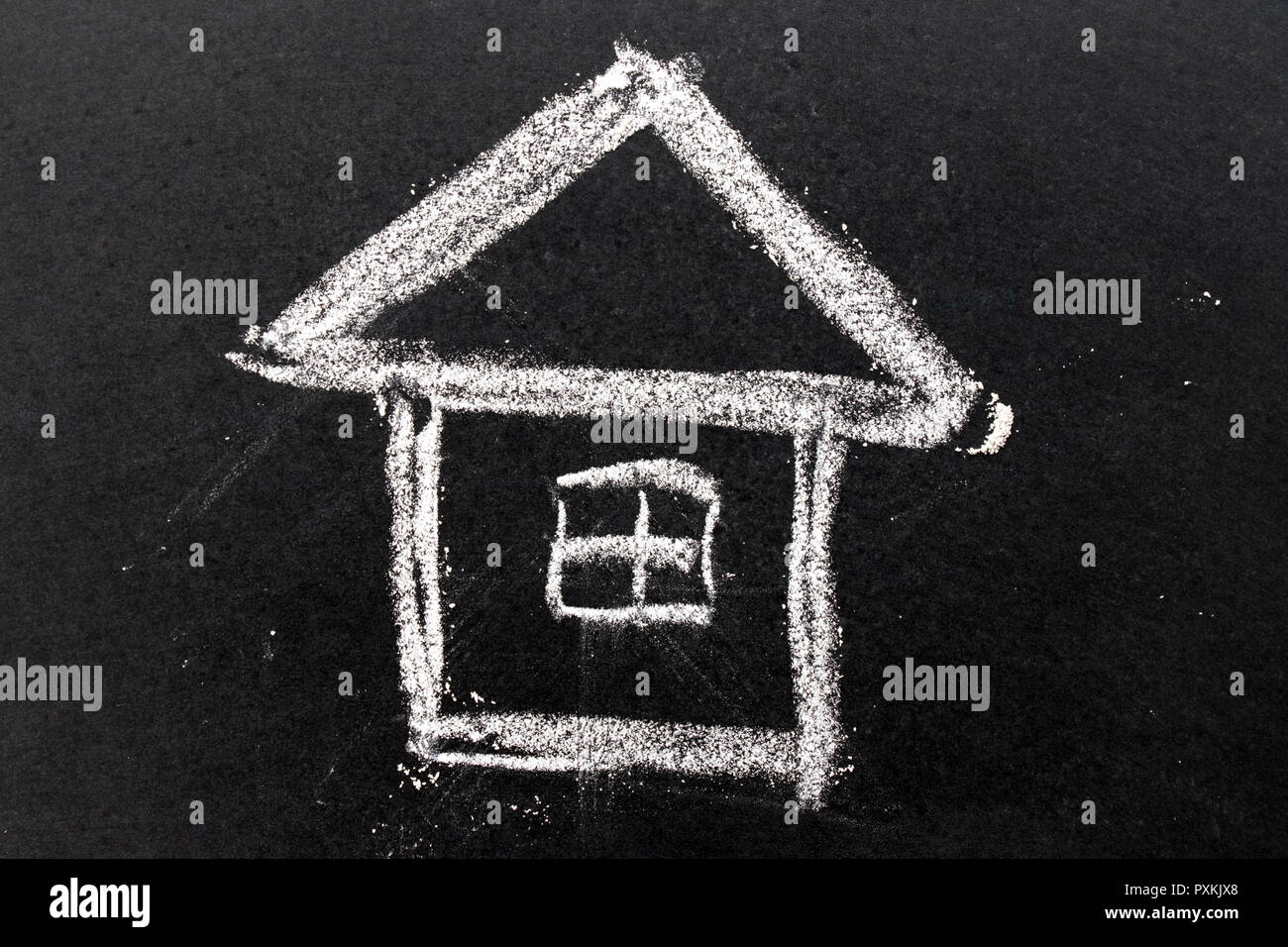 White chalk drawing as house shape on black board background (Concept ...