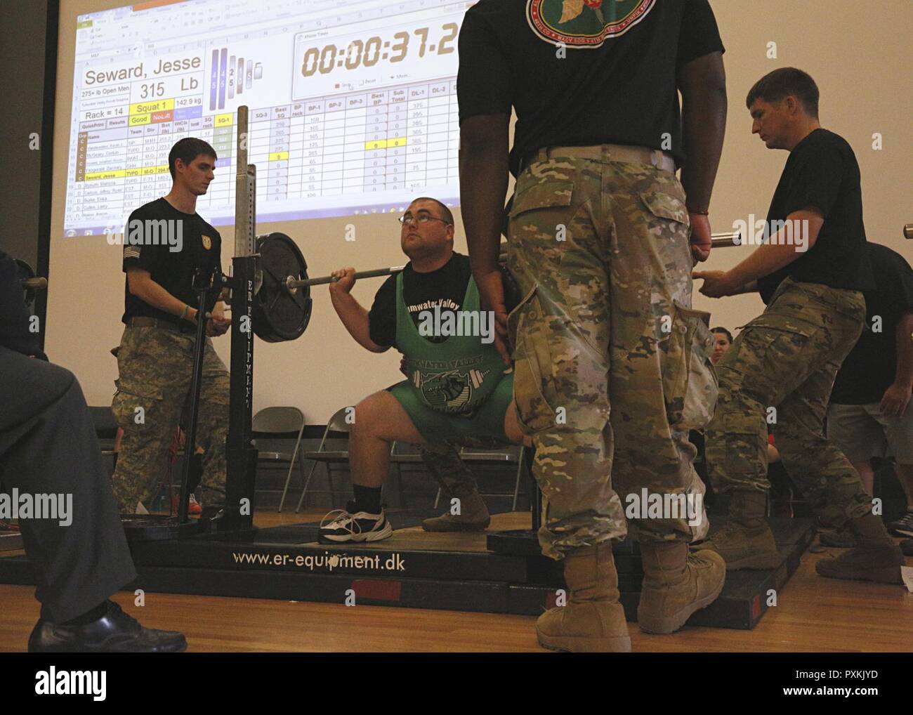Soldiers with 4th Battalion 1st Special Forces Group (Airborne) assist ...