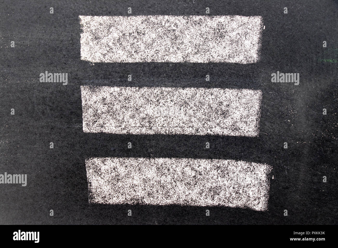 White chalk paint texture on black board background for decoration or ...