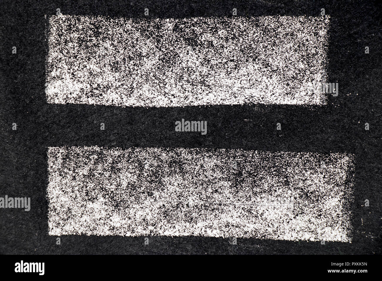 White chalk paint texture on black board background for decoration or ...