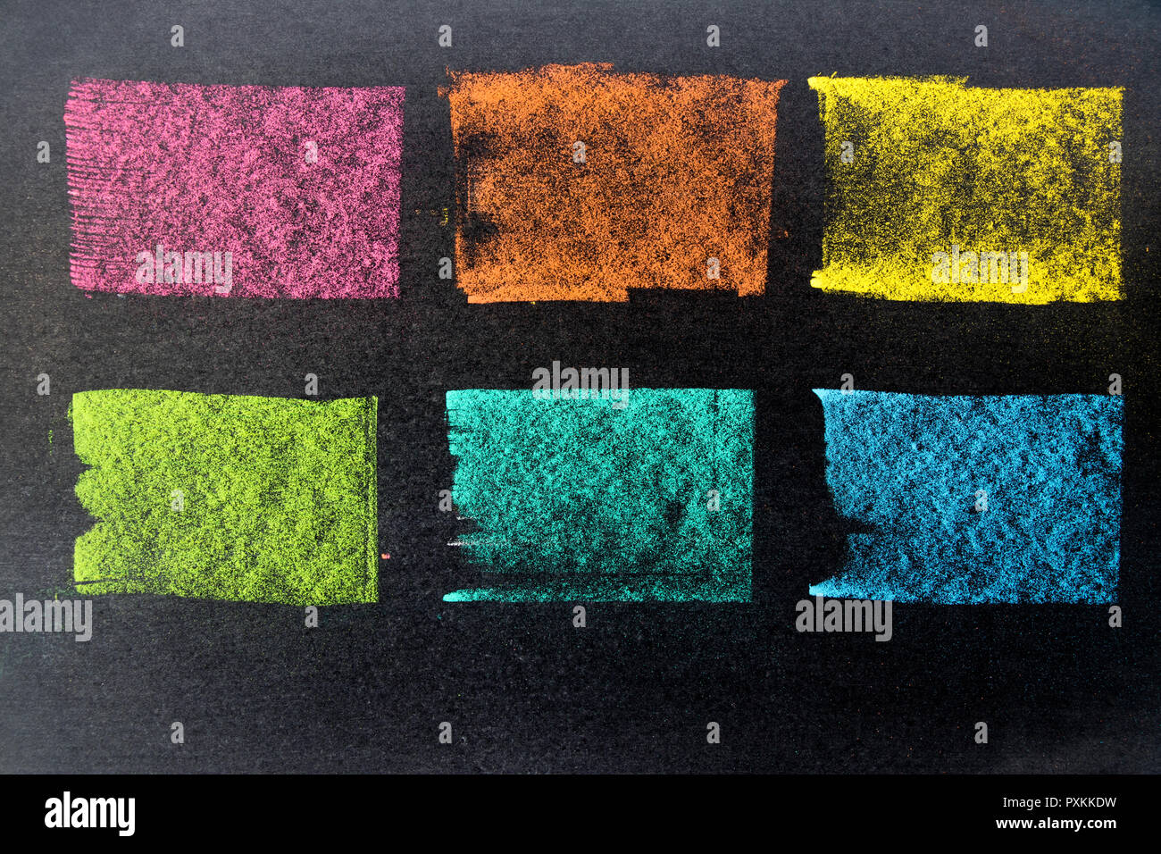 Multi color chalk drawing as striped line on black board background ...