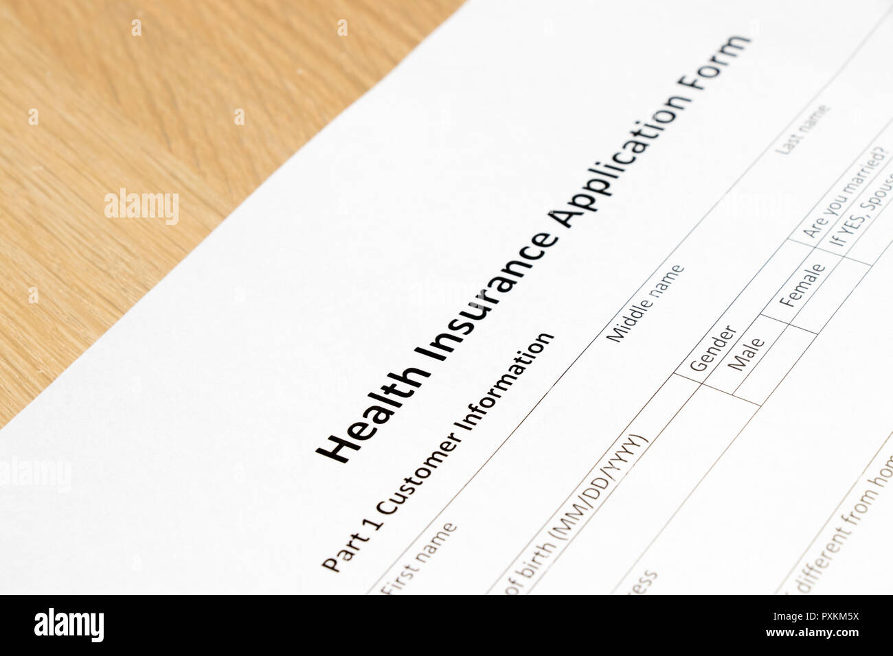 Health insurance application form wait to fill information on desk ...