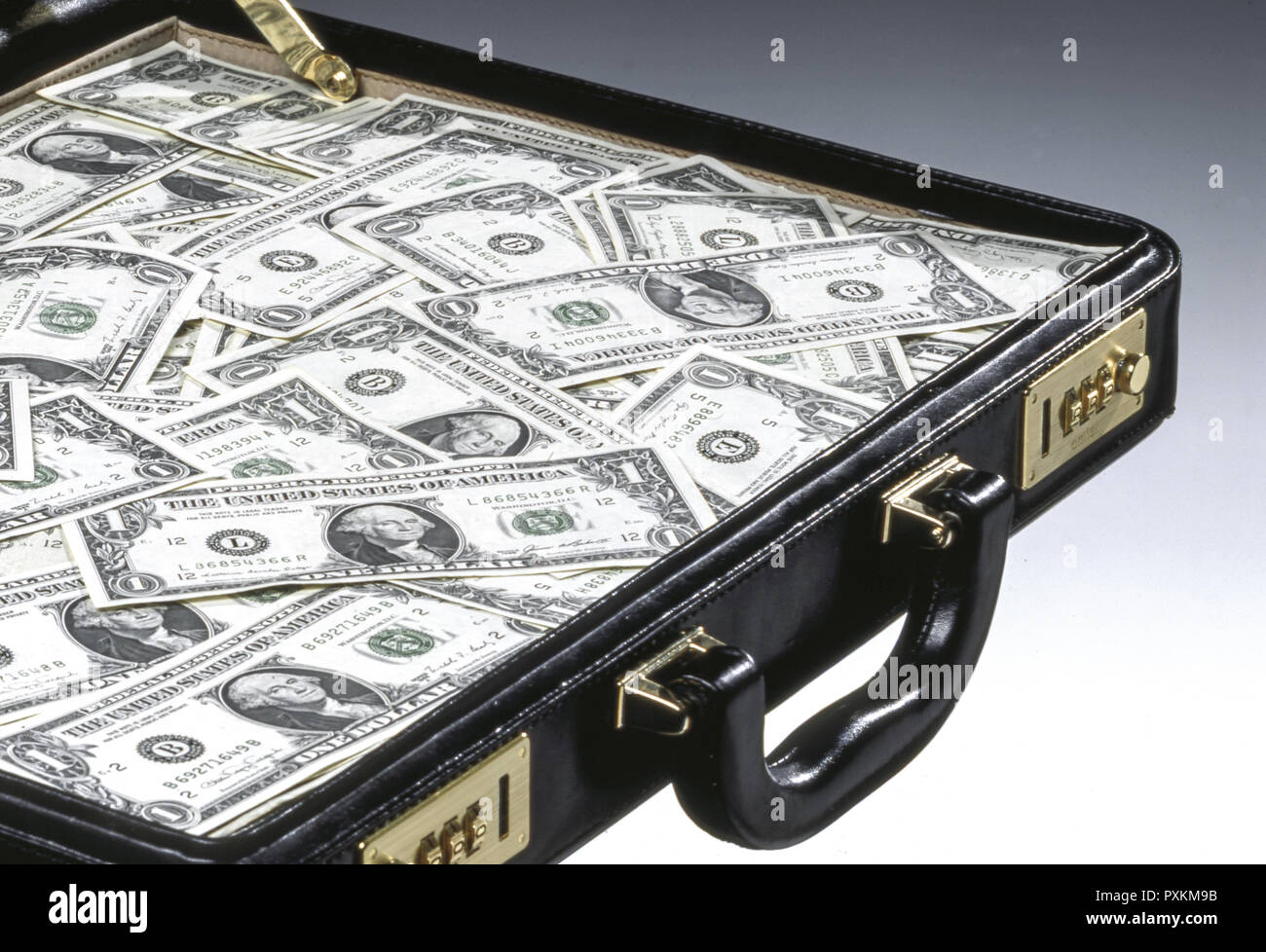 suitcase with Dollar, banknotes Stock Photo - Alamy