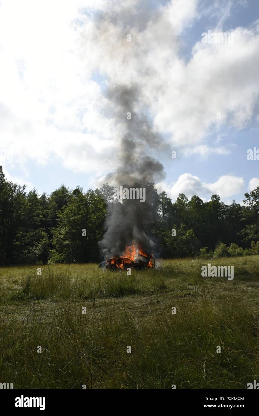 Two dilapidated vehicles are set ablaze to test military emergency ...