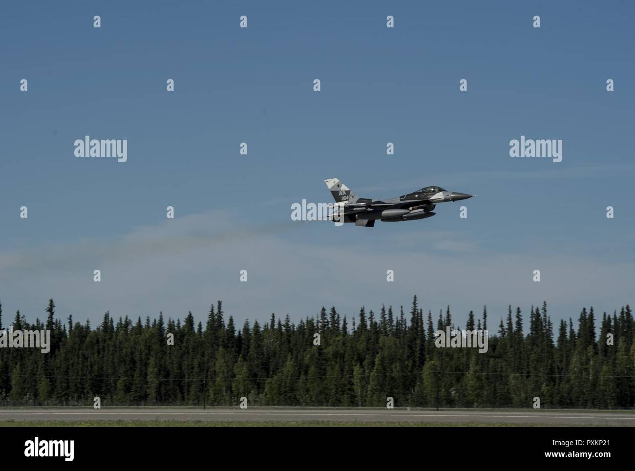 A U.S. Air Force F-16 Aggressor takes off from the flight line during ...