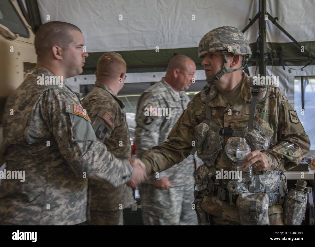 U.S. Army Maj. Gen. Timothy Reisch (right) The Adjutant General, South ...